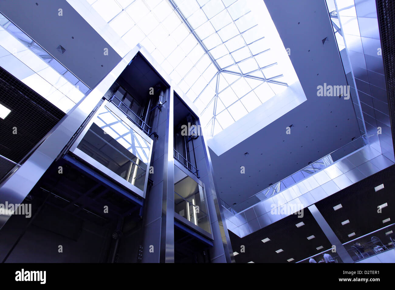 Modern interior of trade center with lift Stock Photo - Alamy