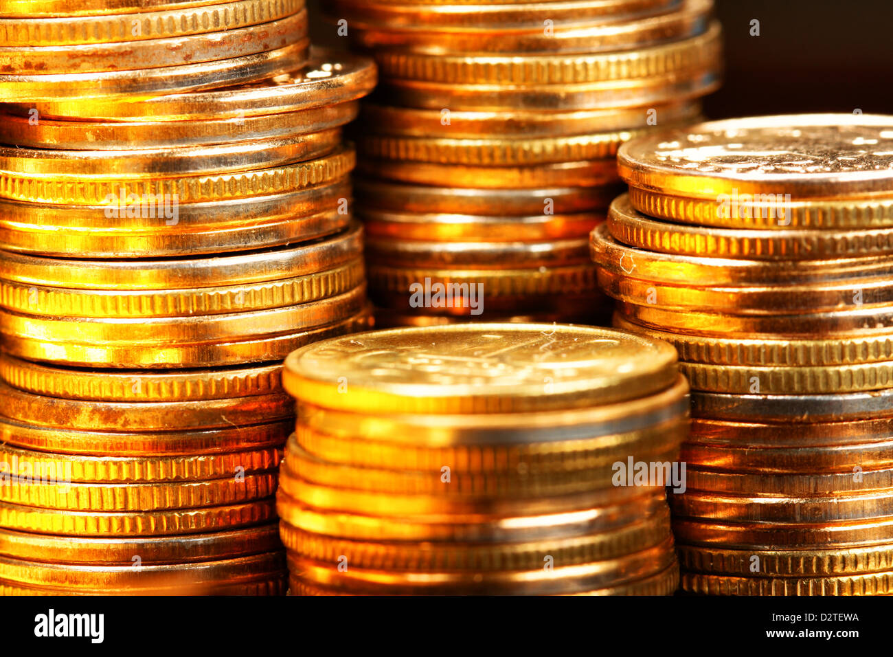 Stacks of the gold coins close up Stock Photo - Alamy