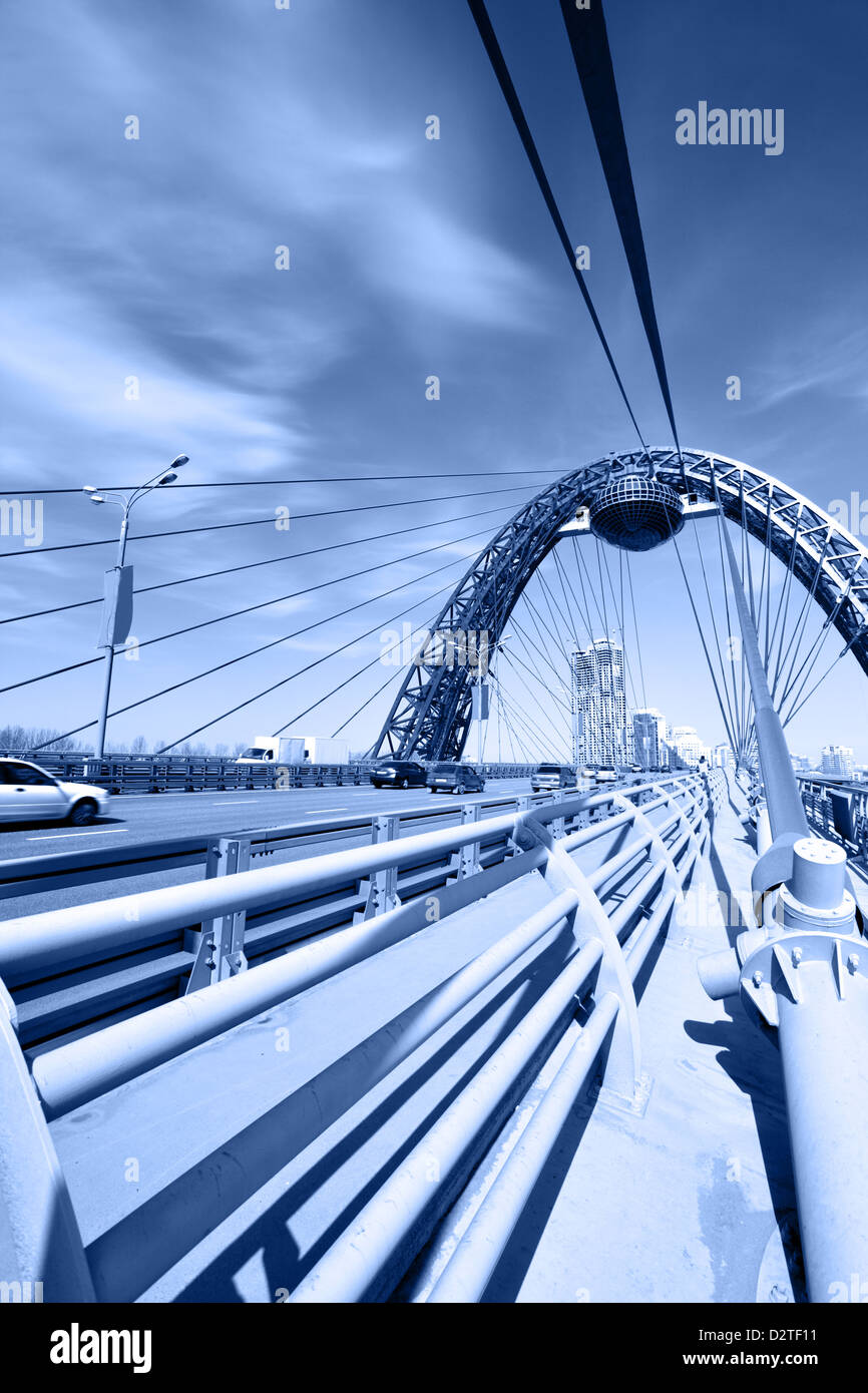 Modern suspension bridge toned in blue color. Moscow. Russia Stock ...