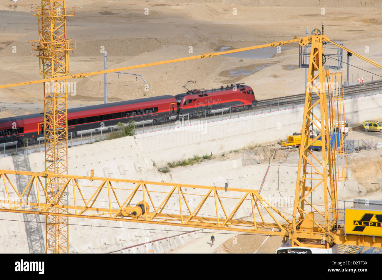 Train driving through the construction site of Vienna Central Station ...