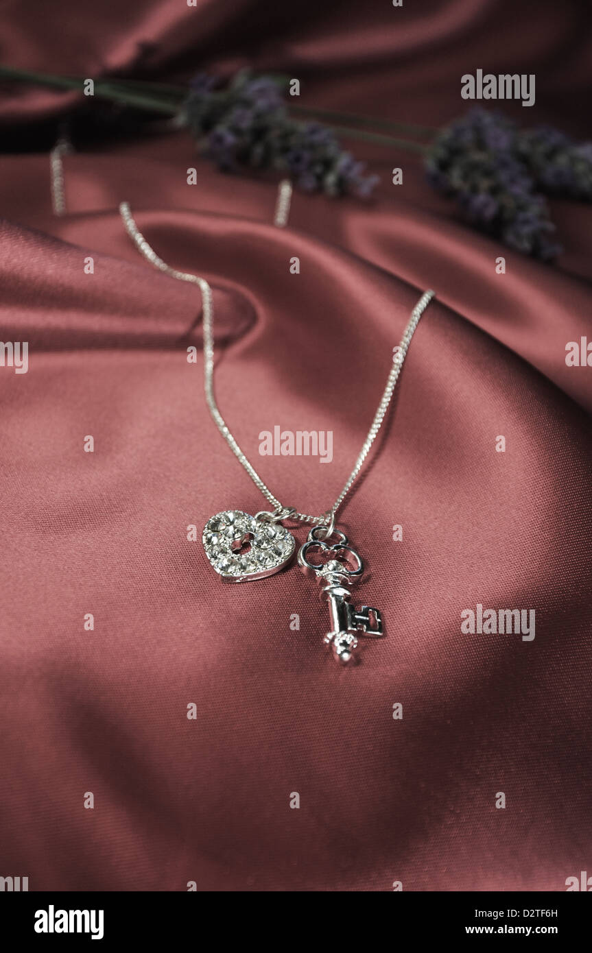 Chain and pendant - lock and key Stock Photo - Alamy