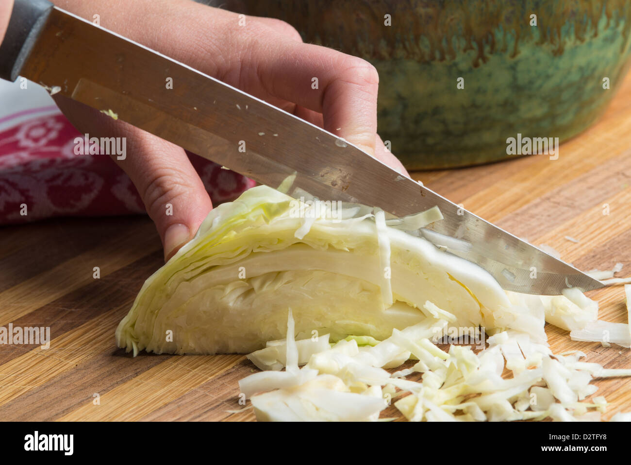 Hand slicing cabbage knife hi-res stock photography and images - Alamy