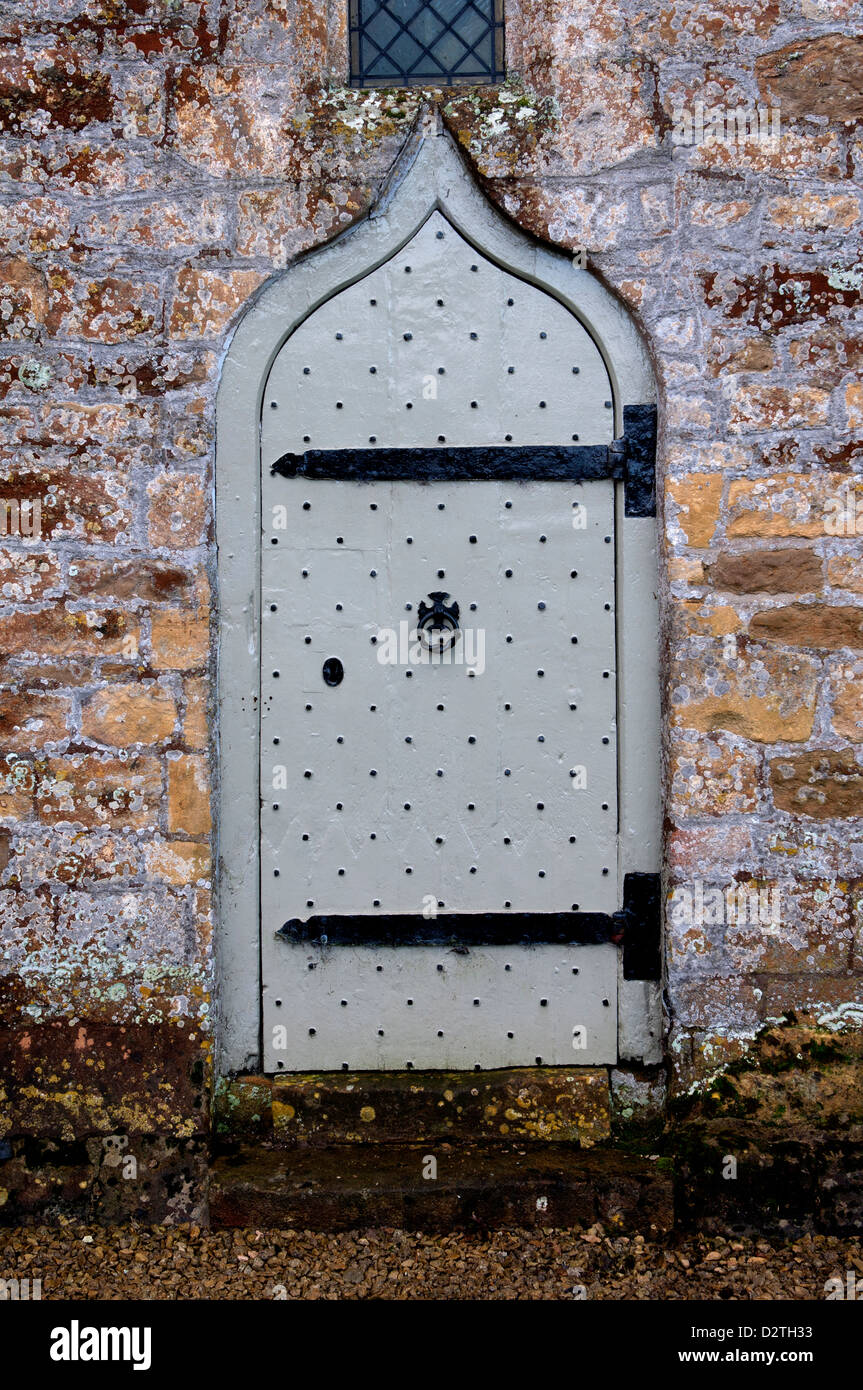 Tower door, St. Peter`s Church, Dumbleton, Gloucestershire, UK Stock ...