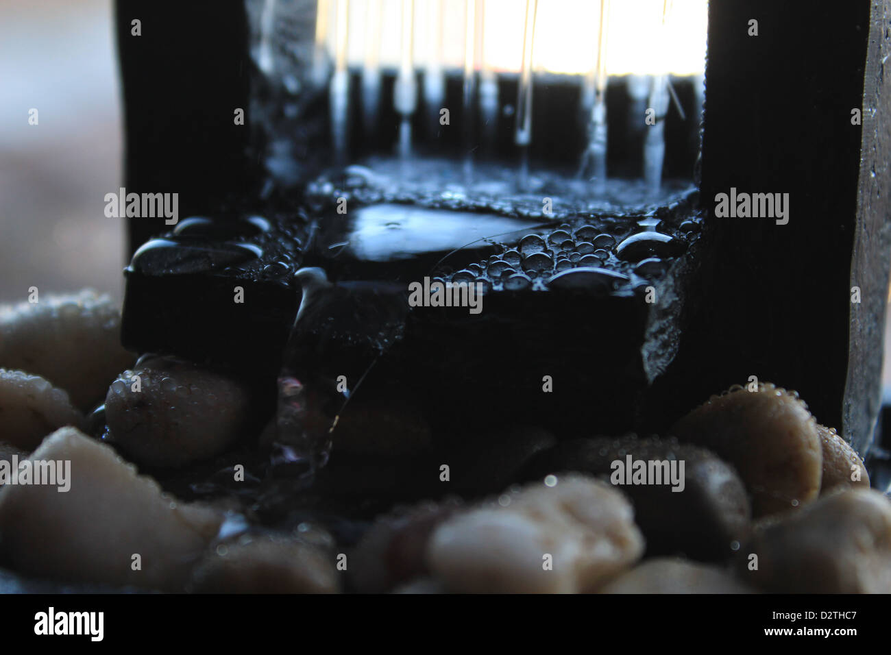 Photo taken of a mini water feature Stock Photo - Alamy