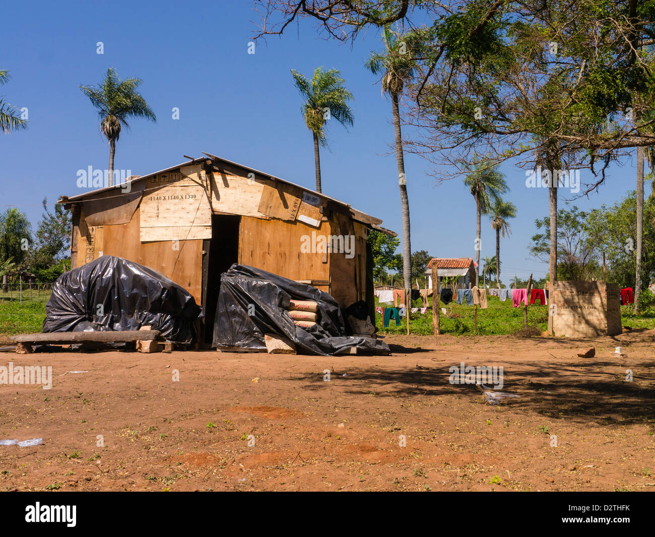 A plywood shack in Luque, Paraguay that is home to a family of five ...