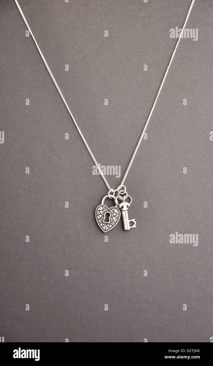 Chain and pendant - lock and key Stock Photo - Alamy