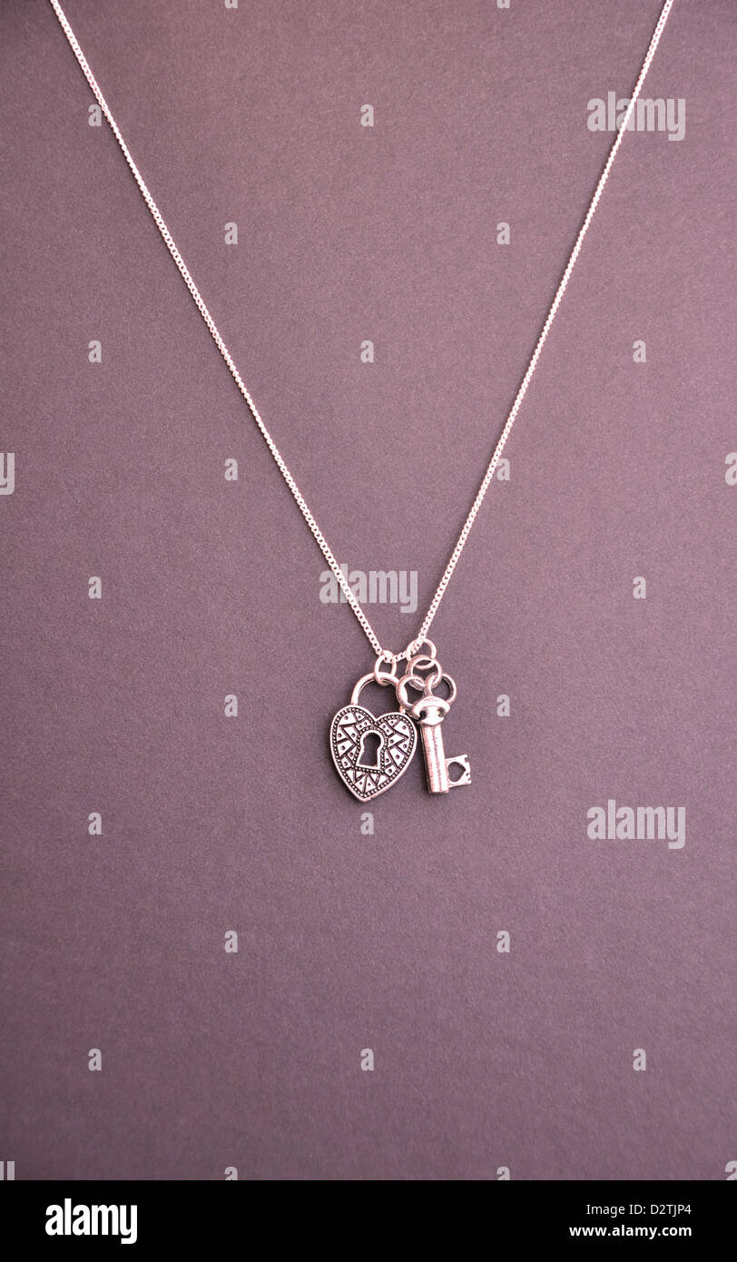 Chain and pendant - lock and key Stock Photo - Alamy