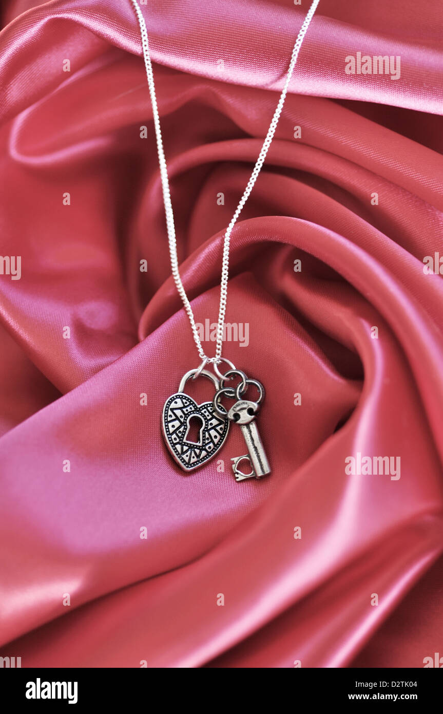 Chain and pendant - lock and key Stock Photo - Alamy