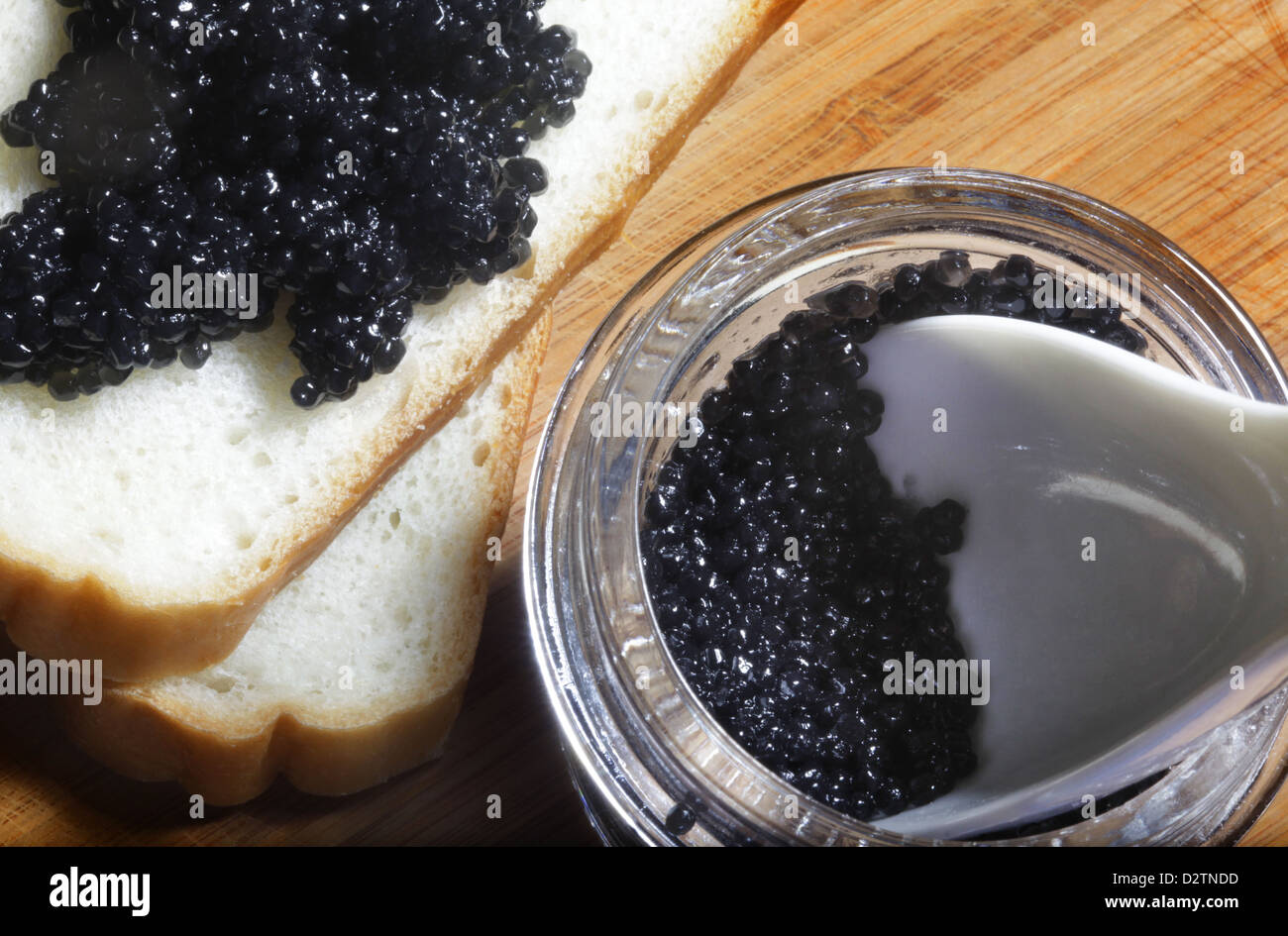 Black caviare in jar hi-res stock photography and images - Alamy
