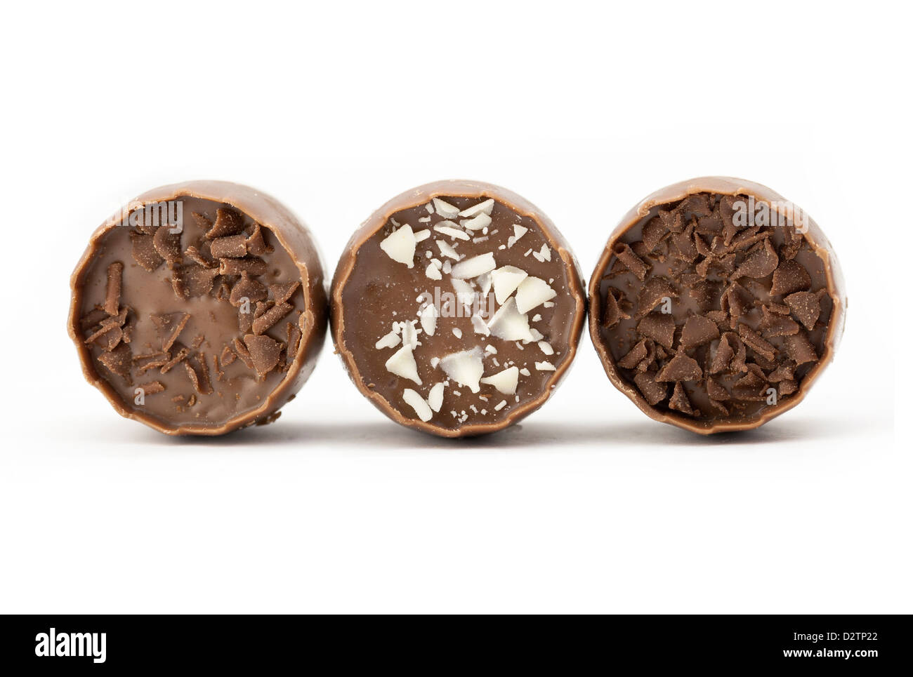Three chocolate candies in a row, iisolated on white background Stock ...