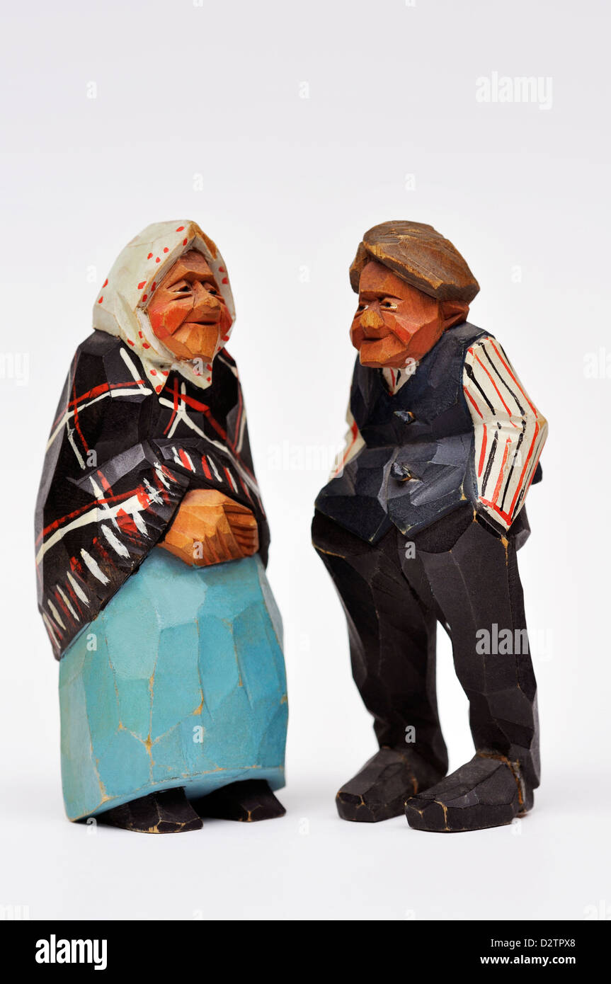 Elderly couple wooden figurines Stock Photo - Alamy