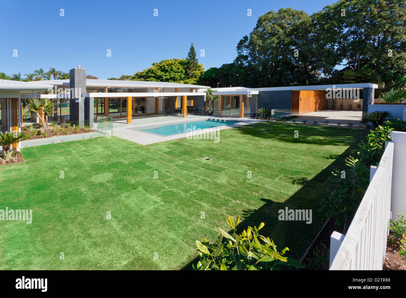 Modern backyard with swimming pool in Australian mansion Stock Photo ...
