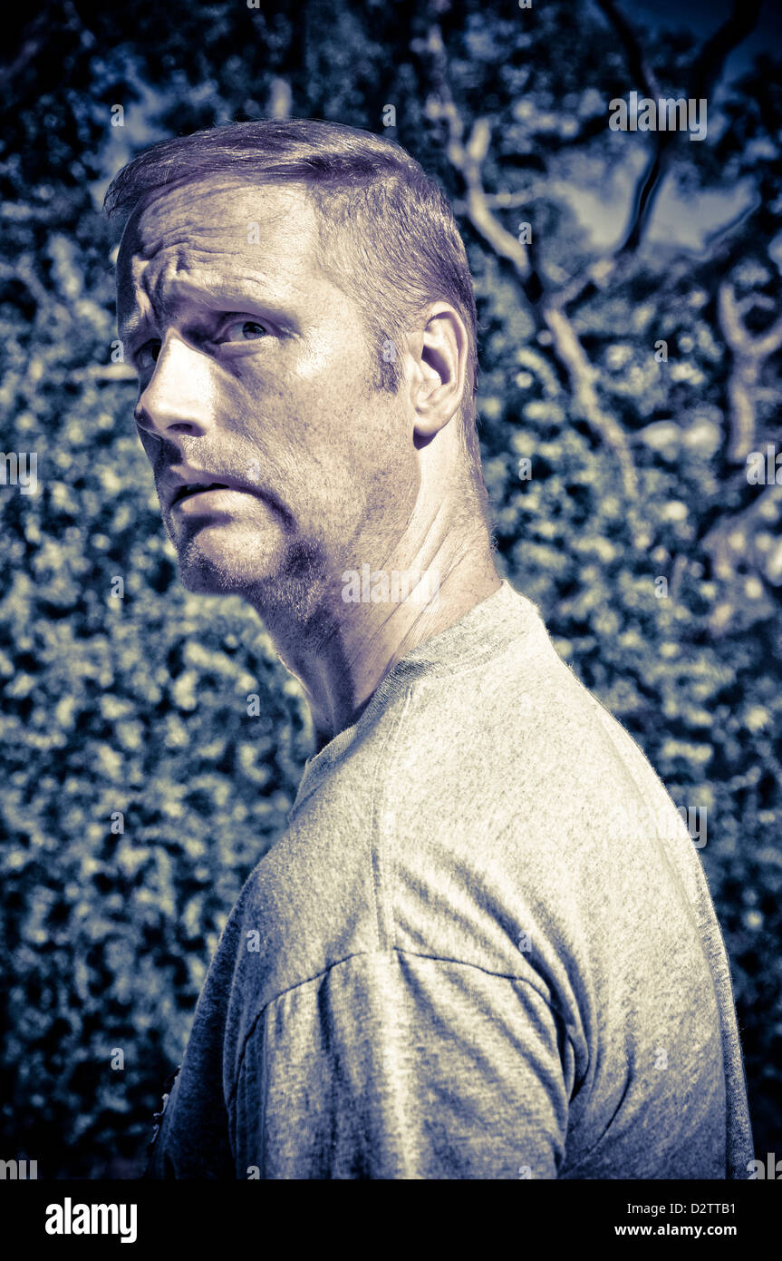 Man Looking Over Shoulder Worried