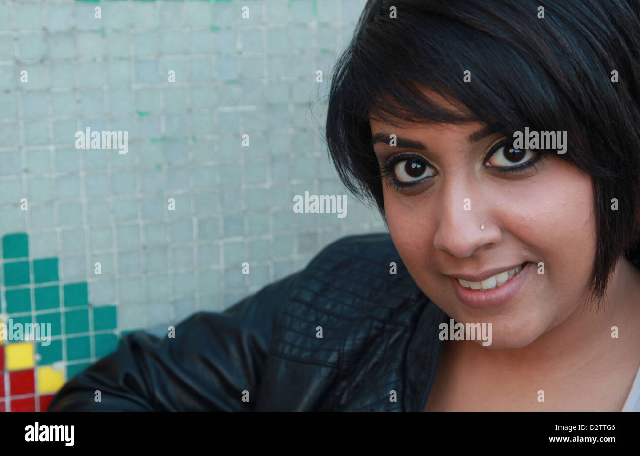 Asian women smiling into camera Stock Photo - Alamy