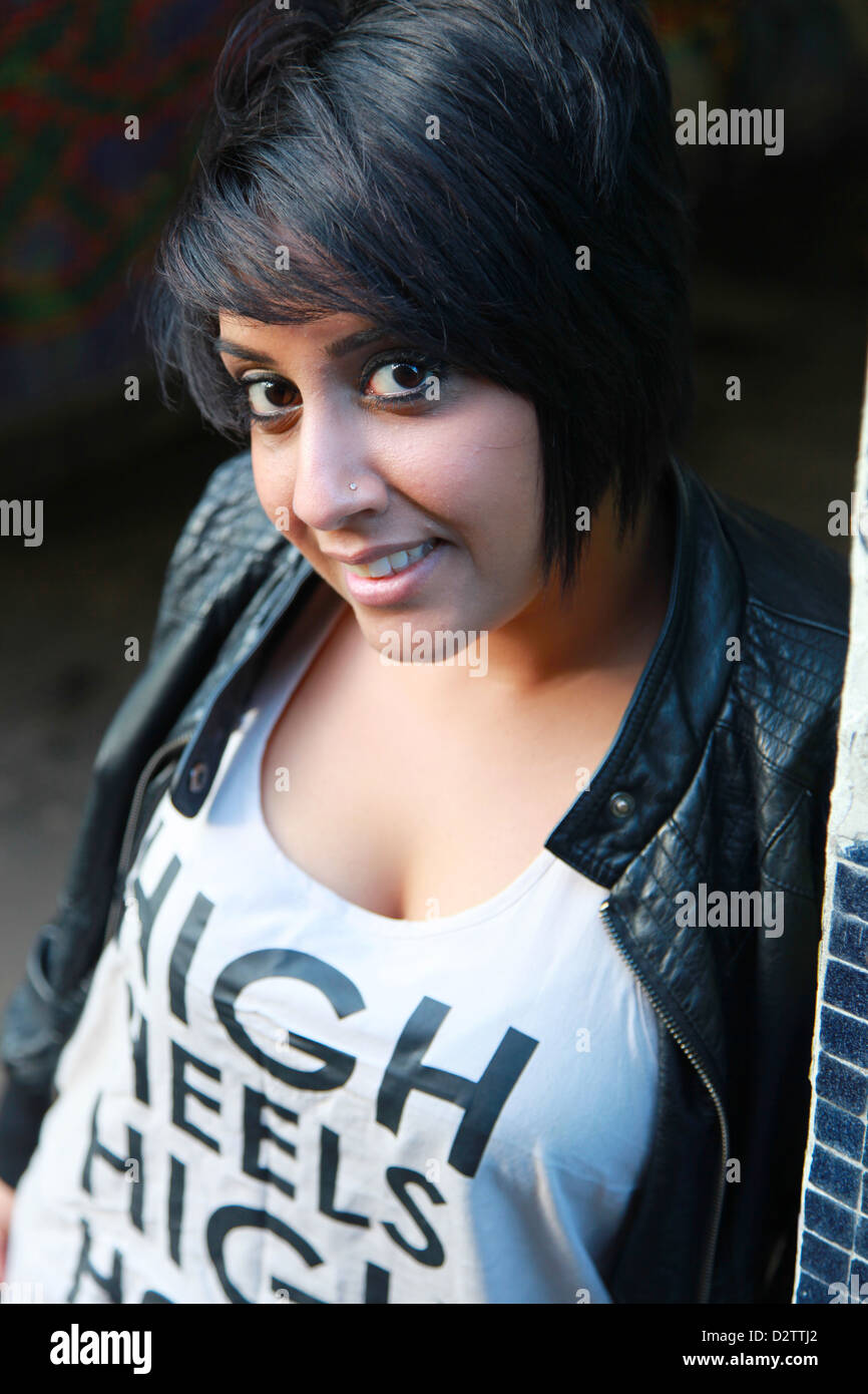Asian women smiling into camera Stock Photo - Alamy
