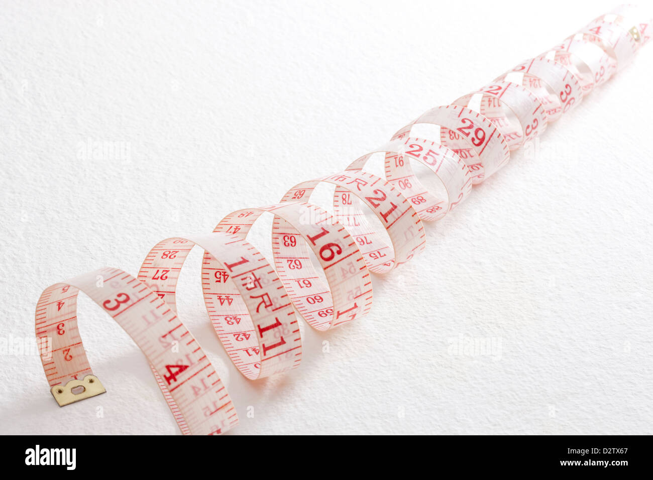Spiral tape measure Stock Photo - Alamy