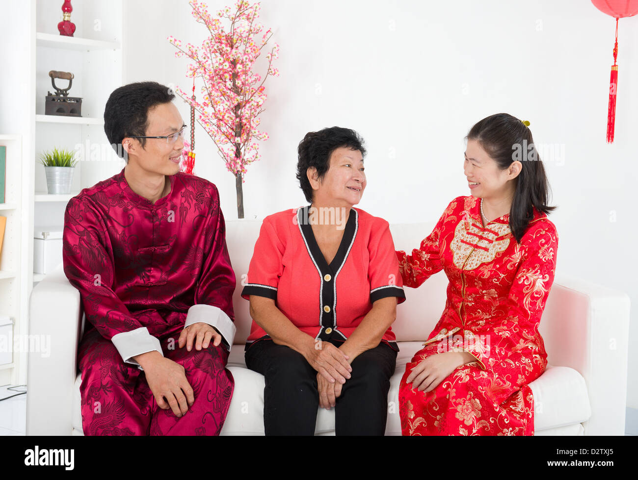 chinese family having a conversation Stock Photo - Alamy