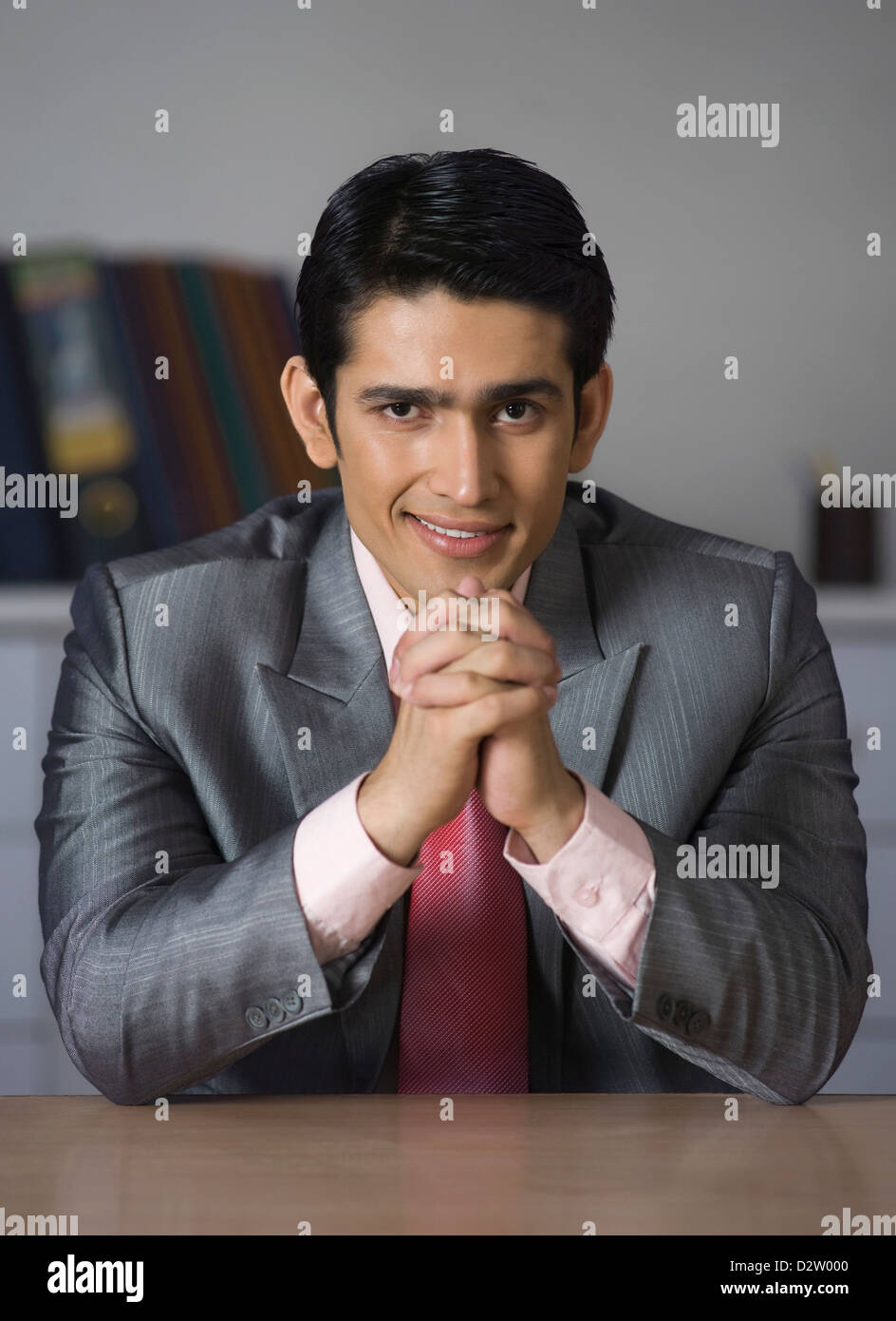 Portrait of a businessman smiling Stock Photo - Alamy