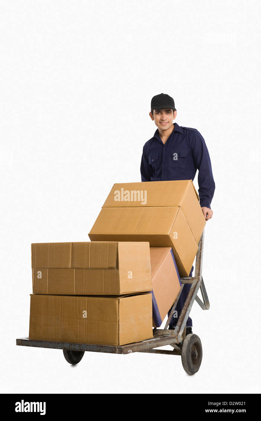 Indian man with a truck Cut Out Stock Images & Pictures - Alamy