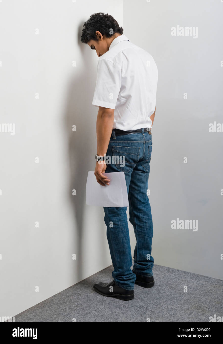 Banging head against wall hi-res stock photography and images - Alamy