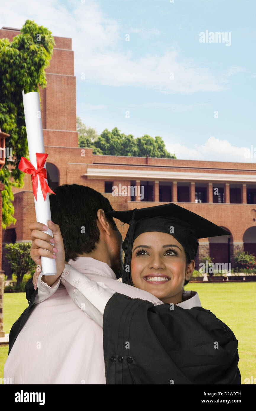 University student hugging her father Stock Photo - Alamy