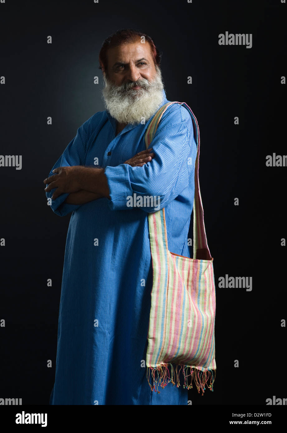 Portrait of a philosopher standing with his arms crossed Stock Photo ...