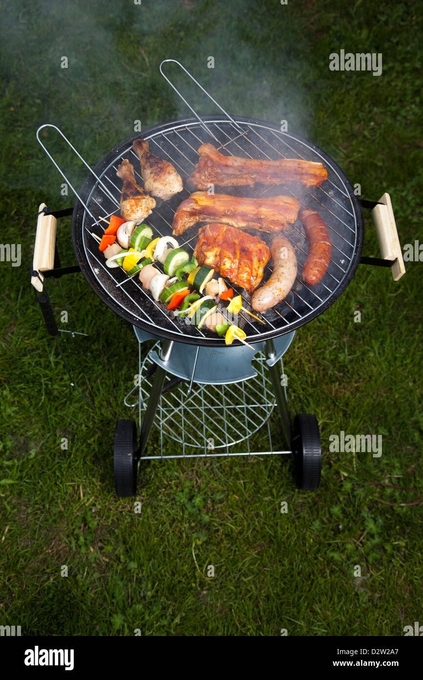 Barbecue a hot summer evening, Grilling Stock Photo - Alamy