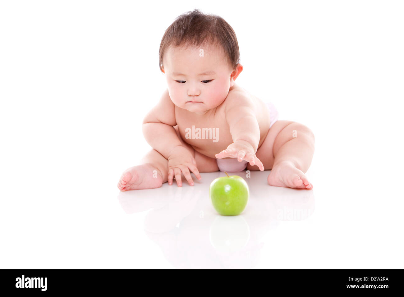 Cute baby girl and apple Stock Photo - Alamy