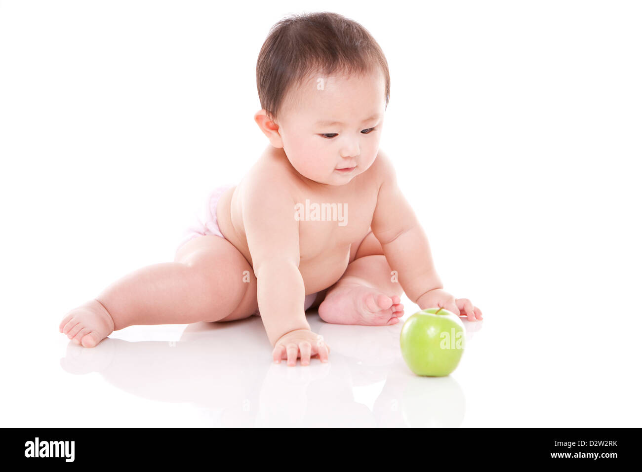 Cute baby girl and apple Stock Photo - Alamy