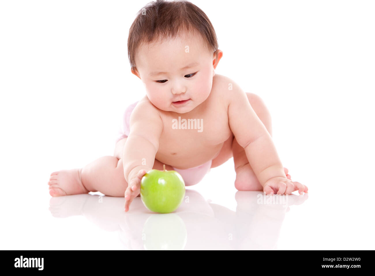 Cute baby girl and apple Stock Photo - Alamy