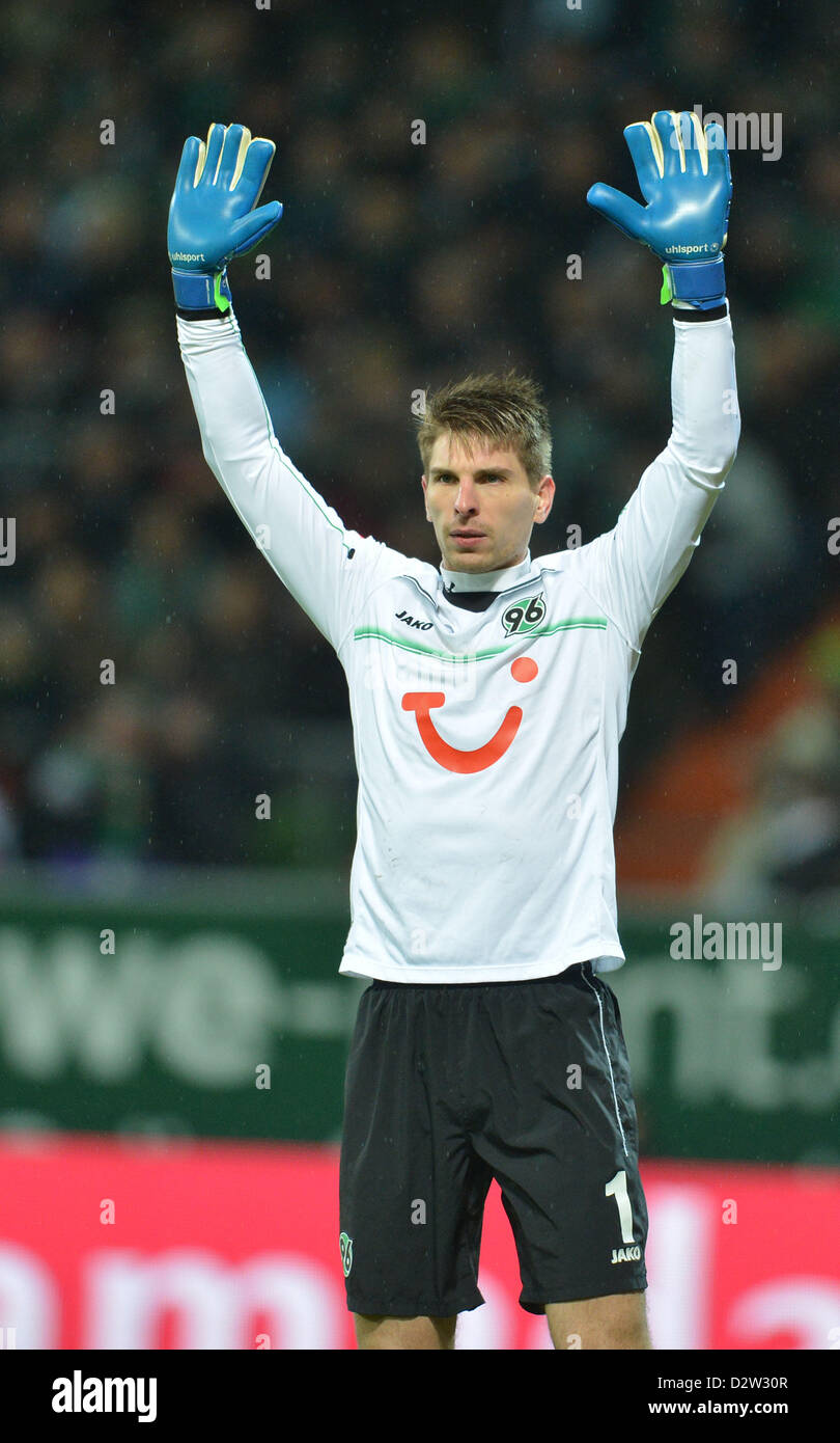 Hanover's goalkeeper Ron-Robert Zieler holds his hands up expecting a ...
