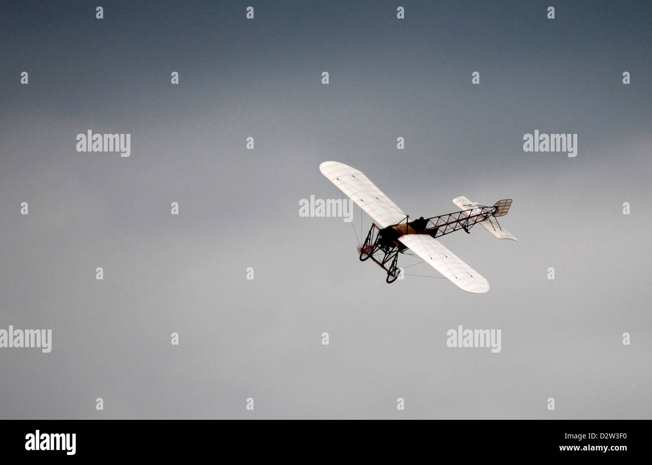 An old antique airplane flays on the sky Stock Photo - Alamy