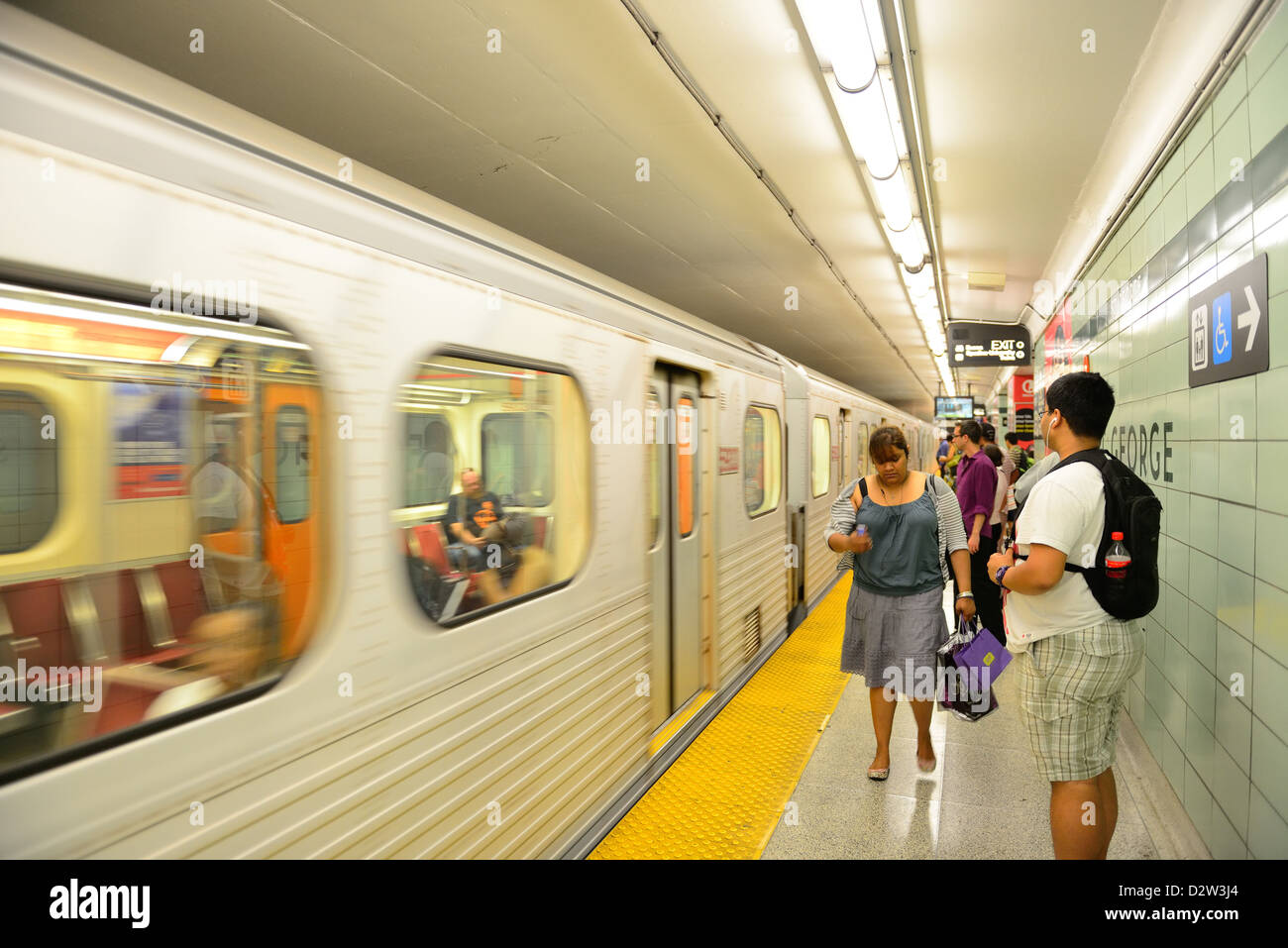 Subway with passengers Stock Photo - Alamy