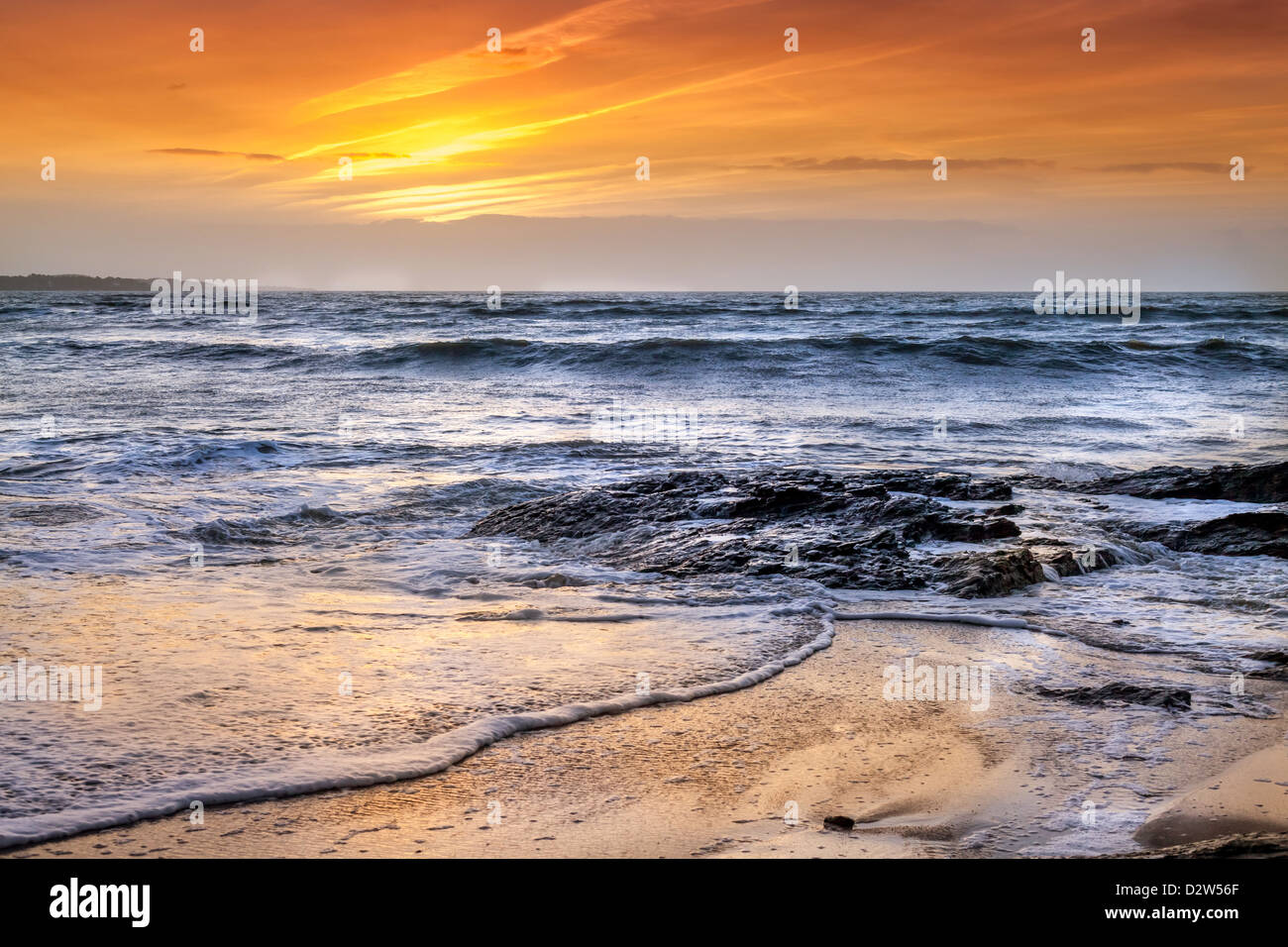 Landscape of sunset over the ocean in France Stock Photo - Alamy