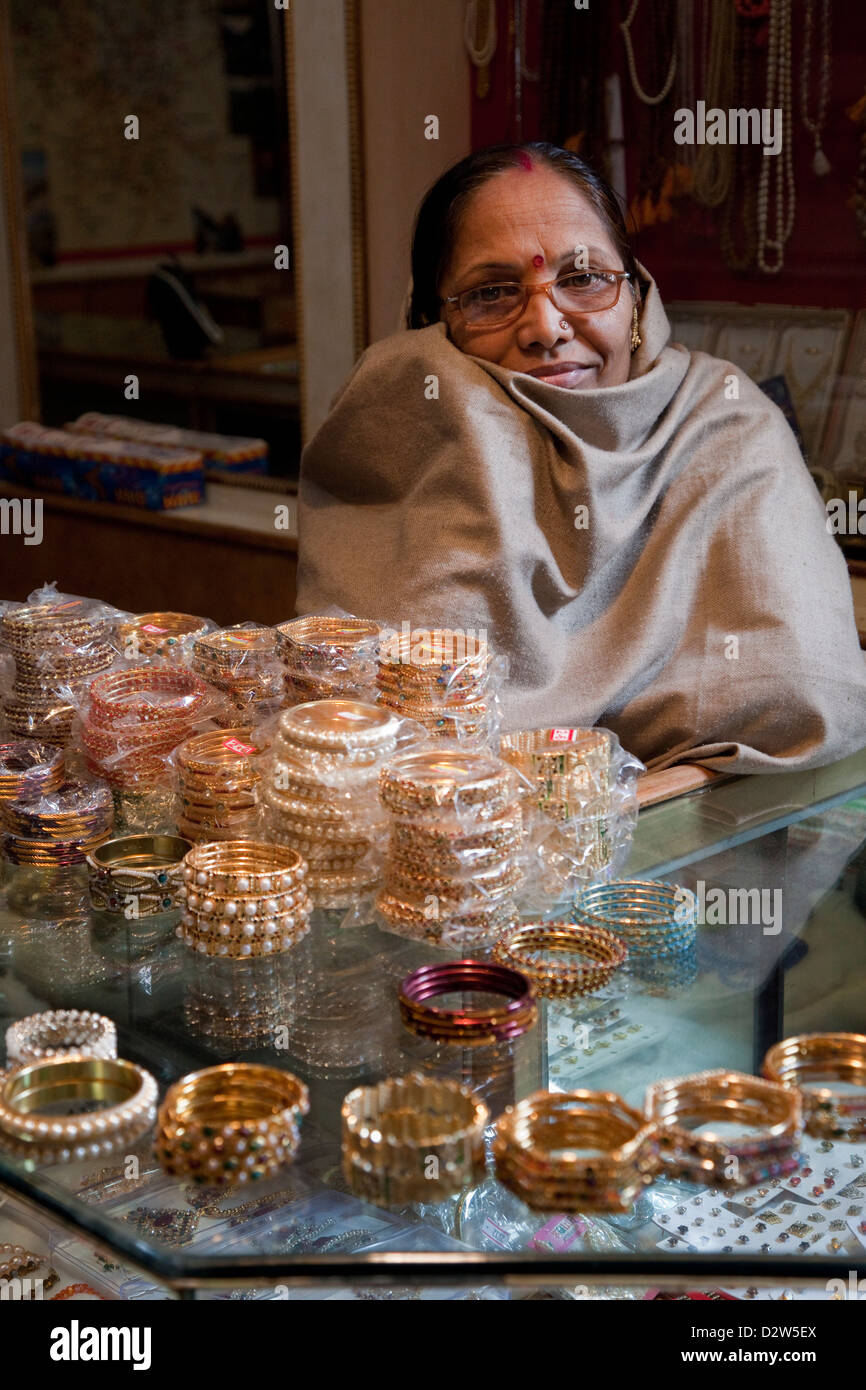 India, Rishikesh. Indian Woman Shopkeeper and Bracelets for Sale. Note ...