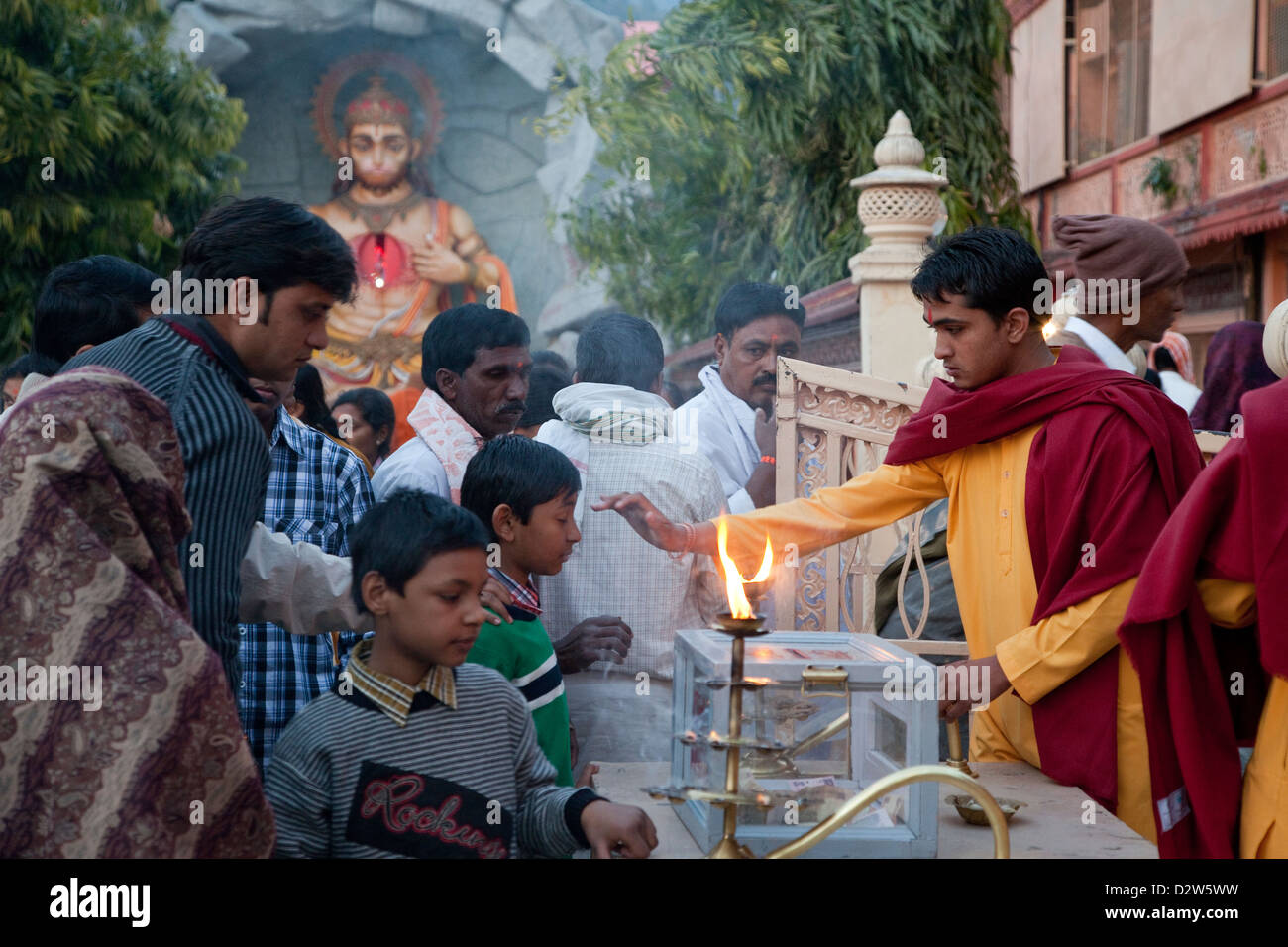 India, Rishikesh. Monk Blessing Boy after Evening Prayer (Aarti) at the ...
