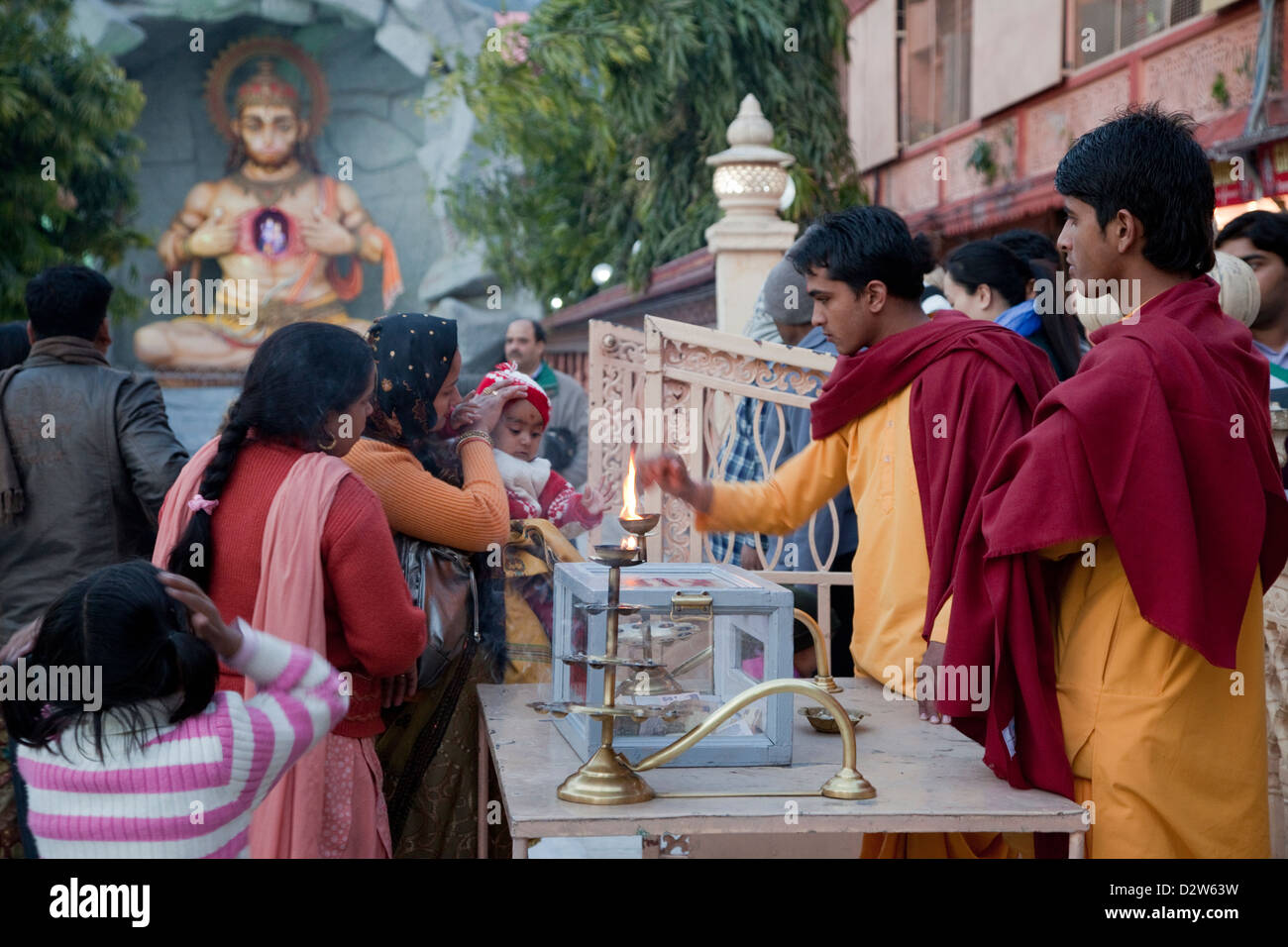 India, Rishikesh. Monk Blessing Baby after Evening Prayer (Aarti) at ...