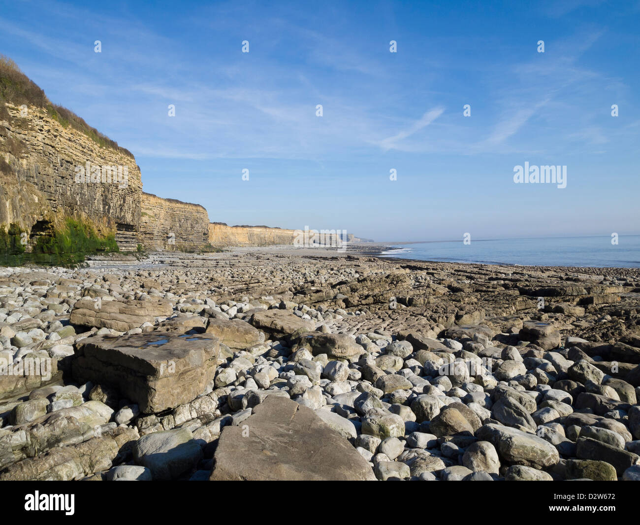 coastal scene with cliffs rocks and boulders Stock Photo - Alamy
