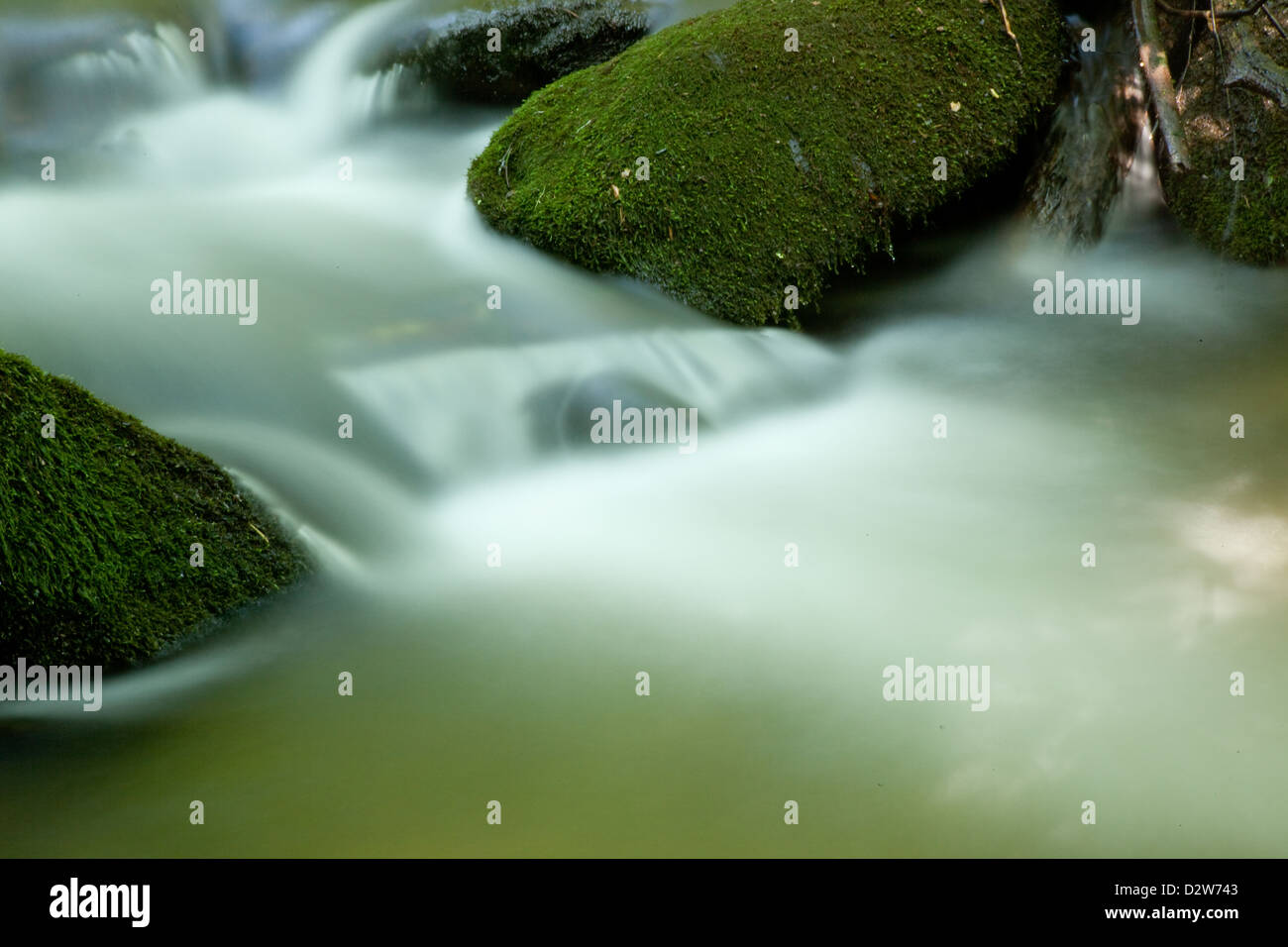 Stream flowing down rocks hi-res stock photography and images - Alamy