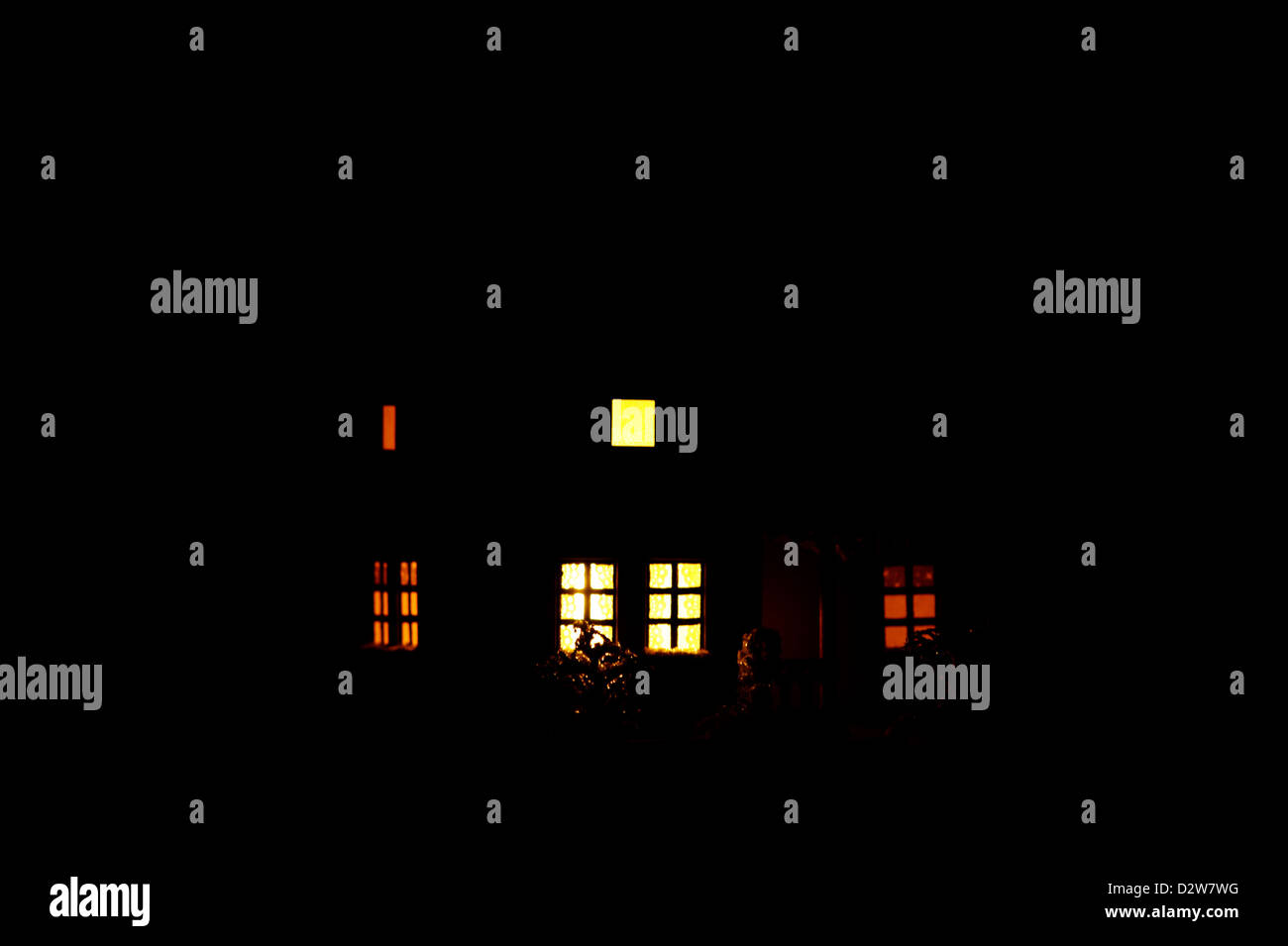 Light windows in the darkness Stock Photo - Alamy