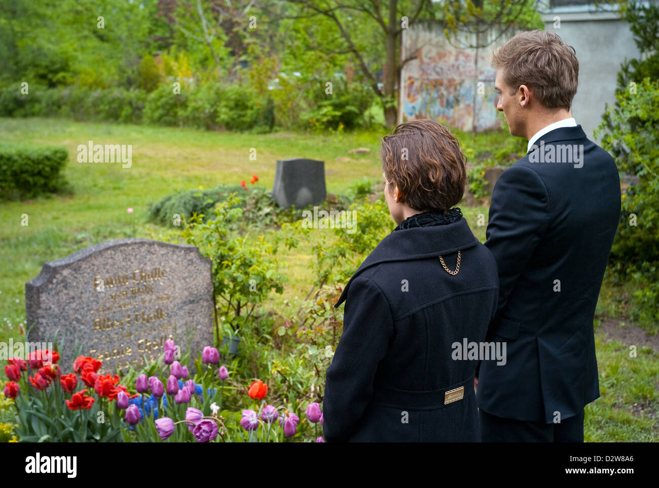 Berlin, Germany, a woman and a man standing at a grave Stock Photo - Alamy