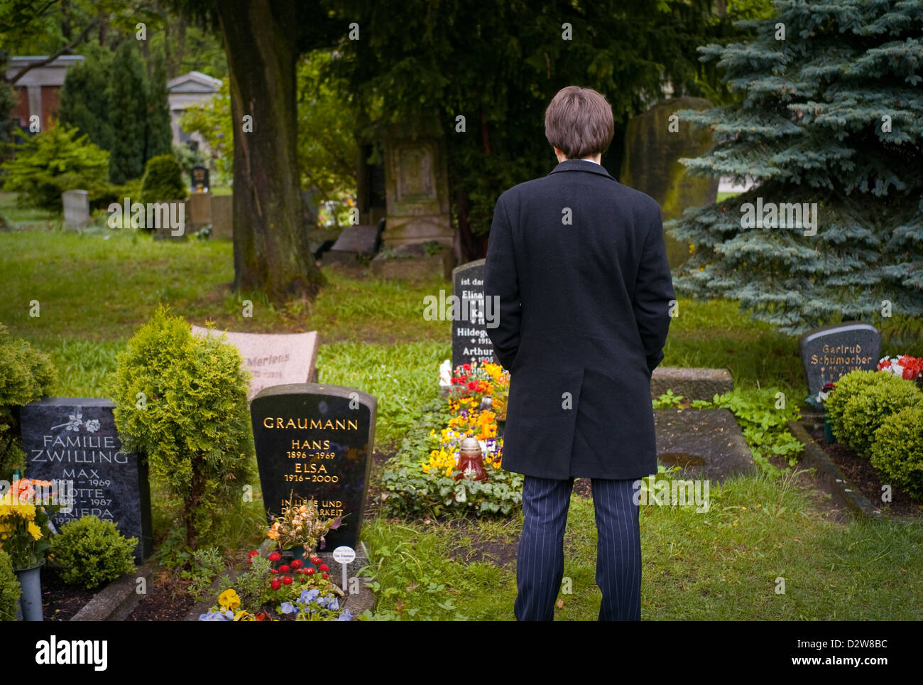 Berlin, Germany, a man standing at a grave Stock Photo - Alamy