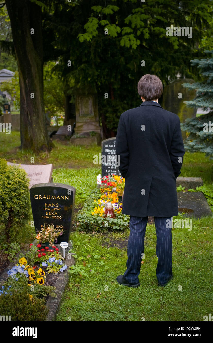 Berlin, Germany, a man standing at a grave Stock Photo - Alamy