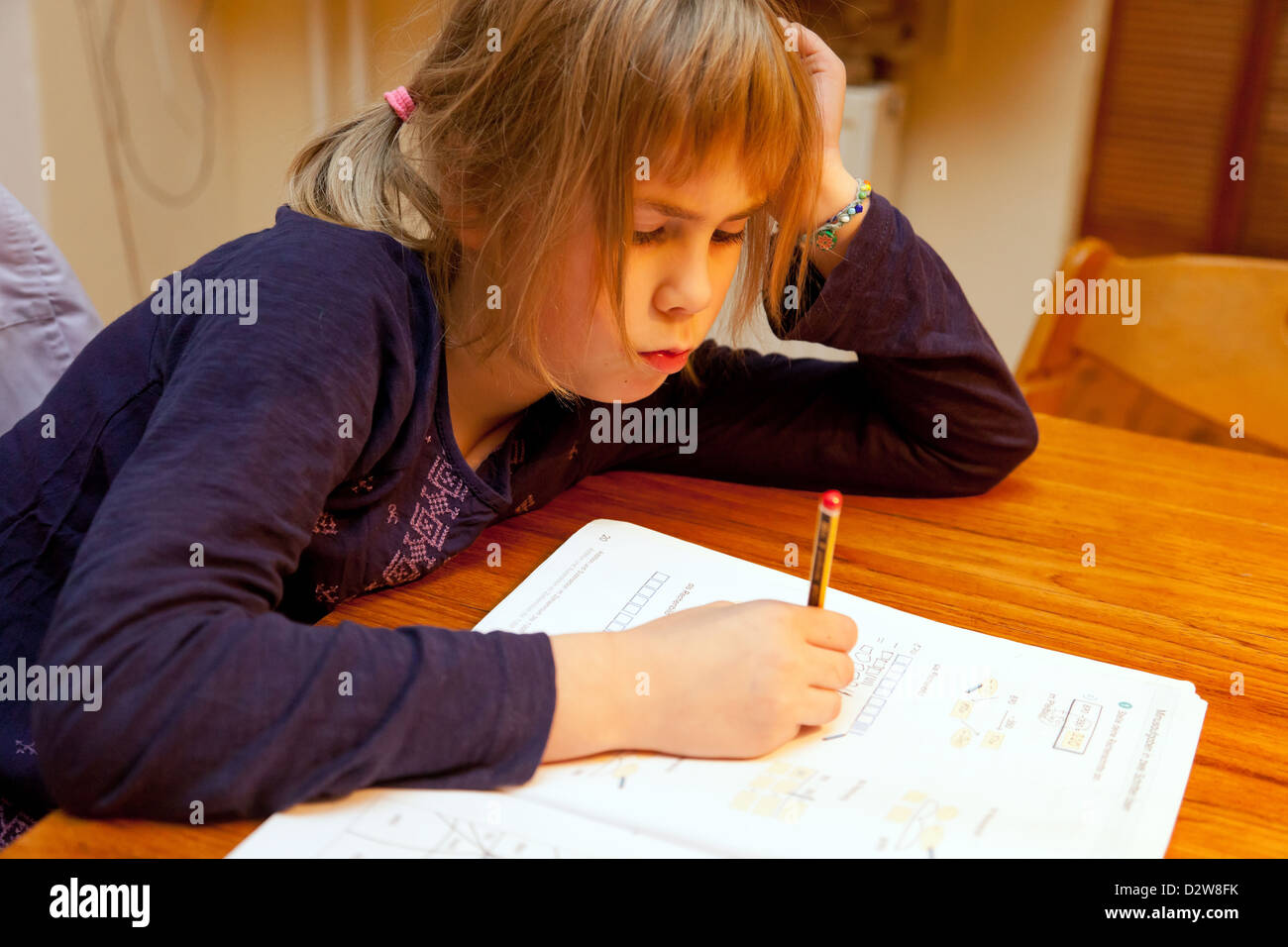 Berlin, Germany, Grundschuelerin on math homework Stock Photo - Alamy