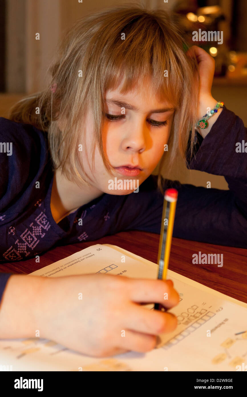 Berlin, Germany, Grundschuelerin on math homework Stock Photo - Alamy