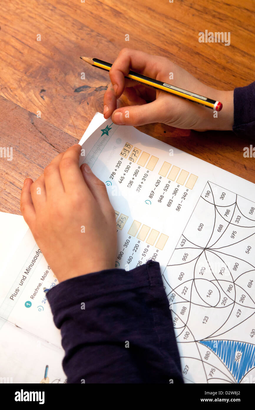 Berlin, Germany, Grundschuelerin on math homework Stock Photo - Alamy