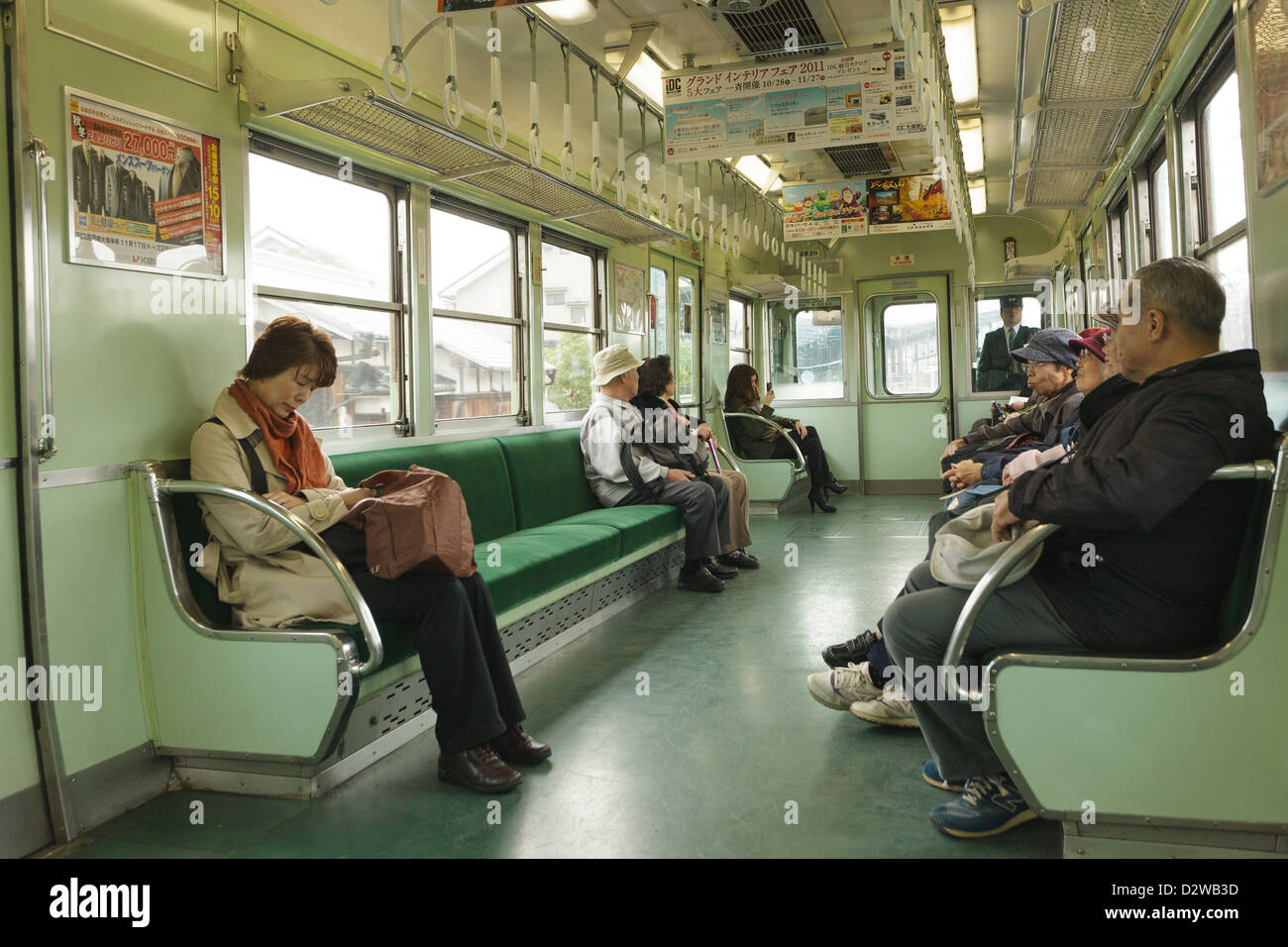 Passengers inside suburban commuter train, Kyoto, Japan Stock Photo - Alamy