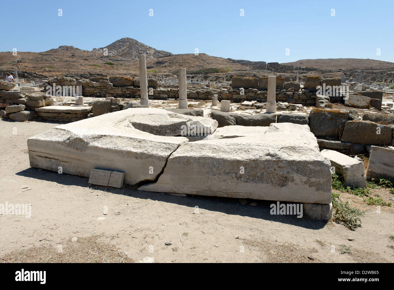 Delos. Greece. The base of the Colossal statue of Apollo next to the ...