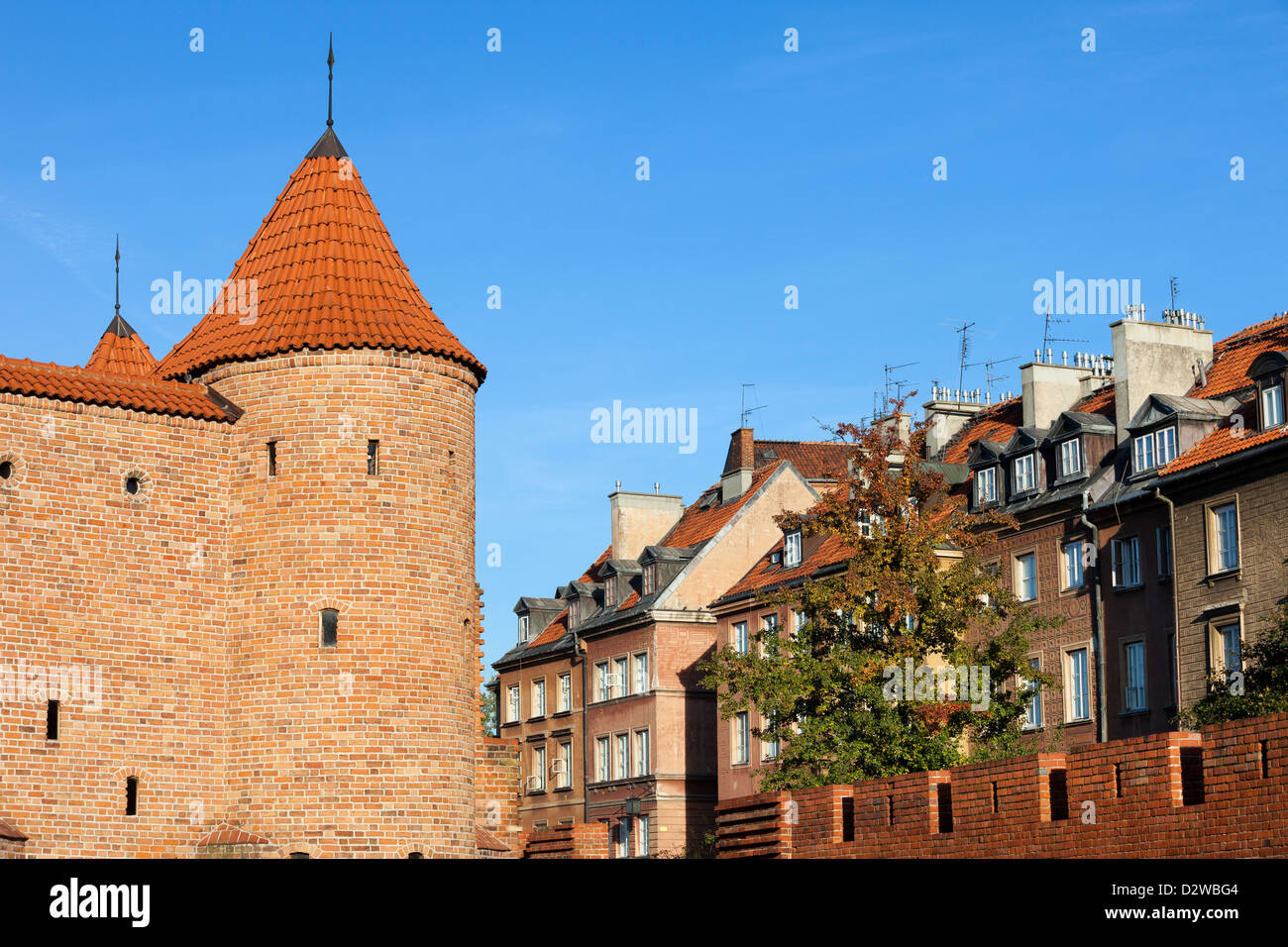 Barbican fortification and tenement houses in the Old Town of Warsaw ...