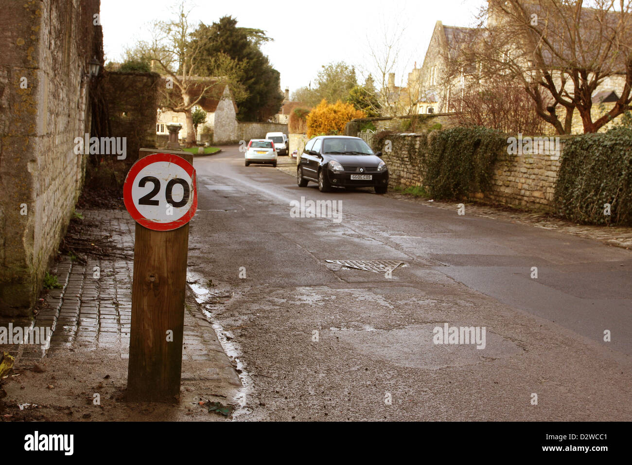 Village 20 mph speed limit restriction sign in the Village of Newton St ...